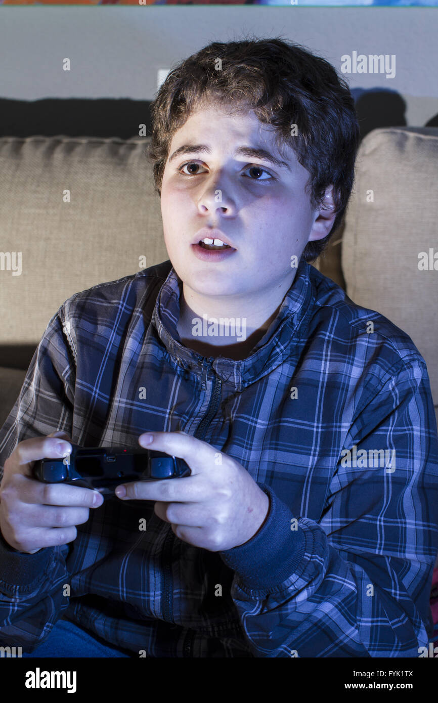 boy with joystick playing computer game at home Stock Photo - Alamy