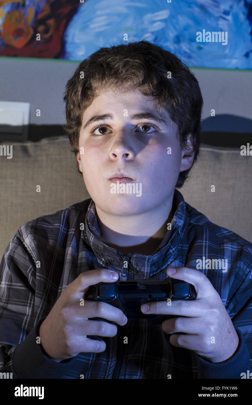 boy with joystick playing computer game at home Stock Photo - Alamy