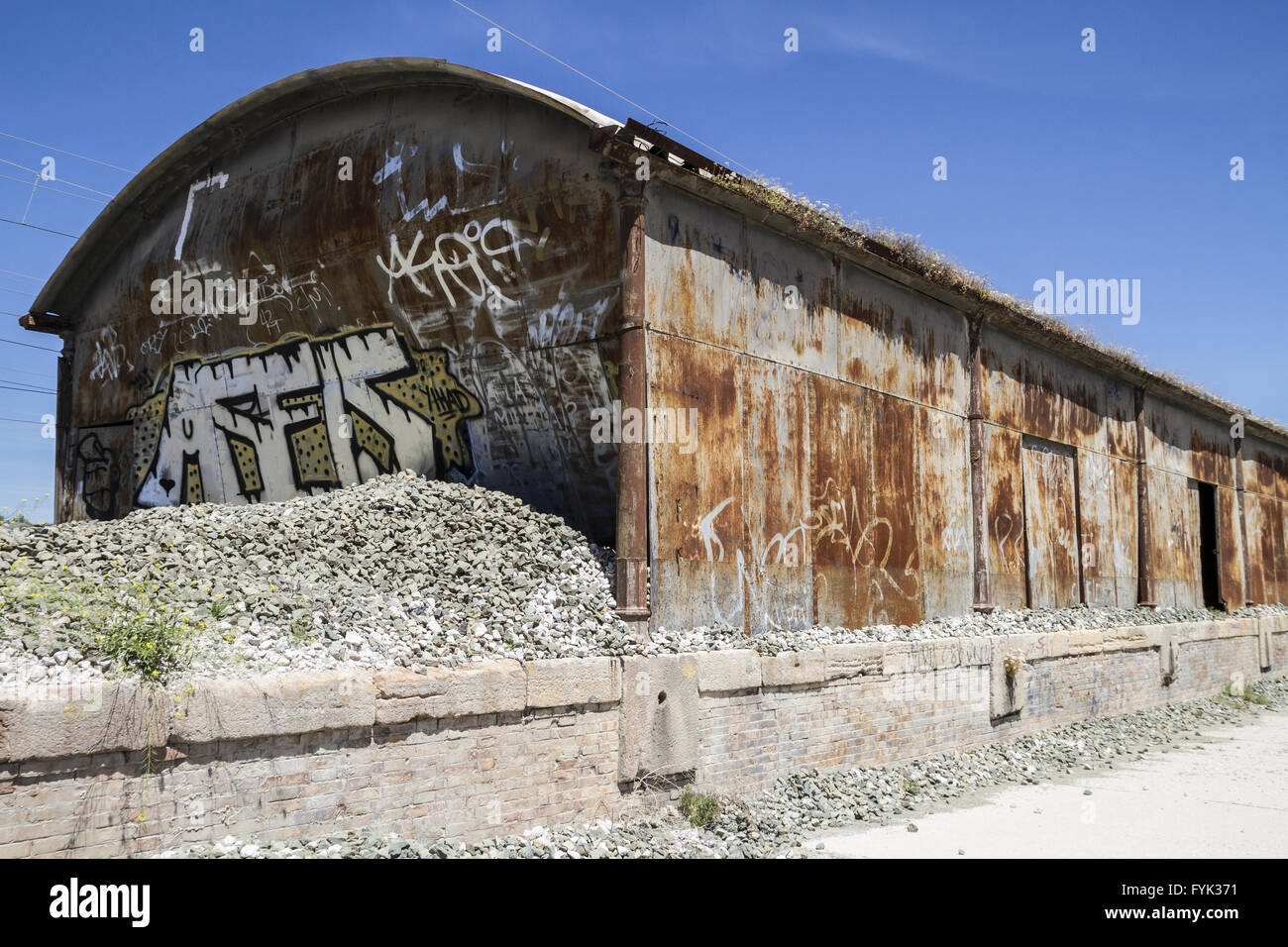old abandoned train station, rusty iron walls Stock Photo - Alamy