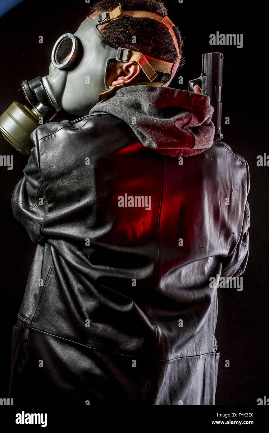 Private detective with bulletproof vest and gas mask Stock Photo - Alamy