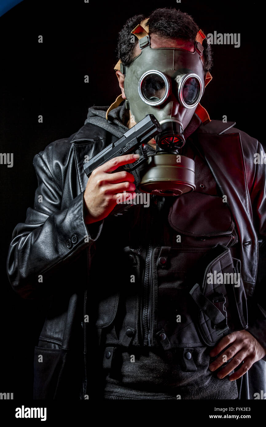 Private detective with bulletproof vest and gas mask, gear Stock Photo ...