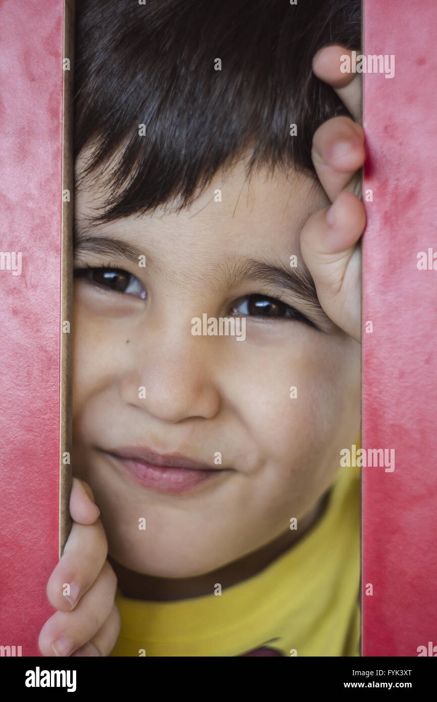 preschool child in a park putting expressive faces Stock Photo - Alamy