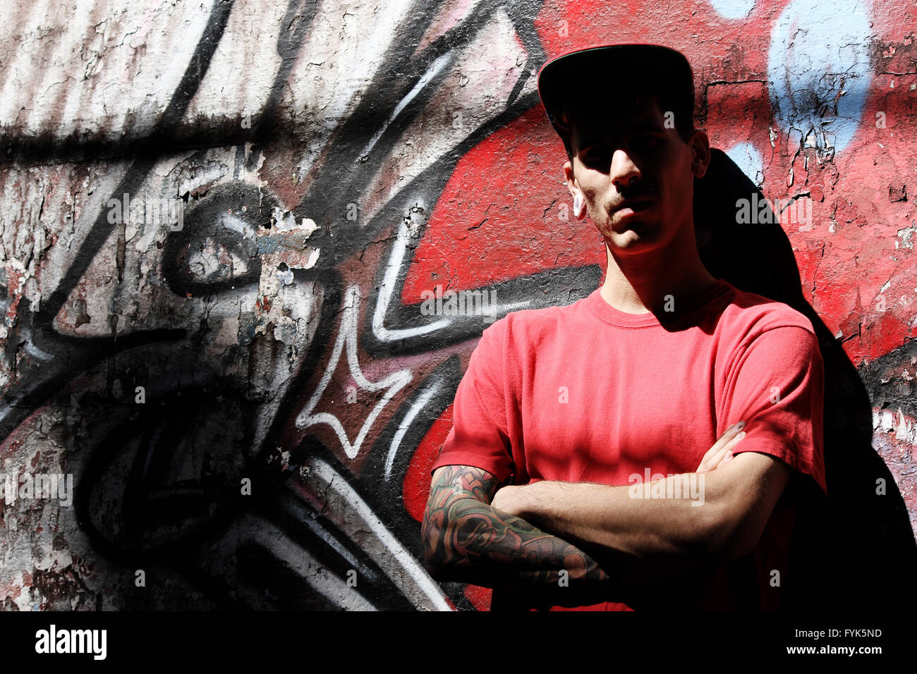 Rapper leaning on wall hi-res stock photography and images - Alamy