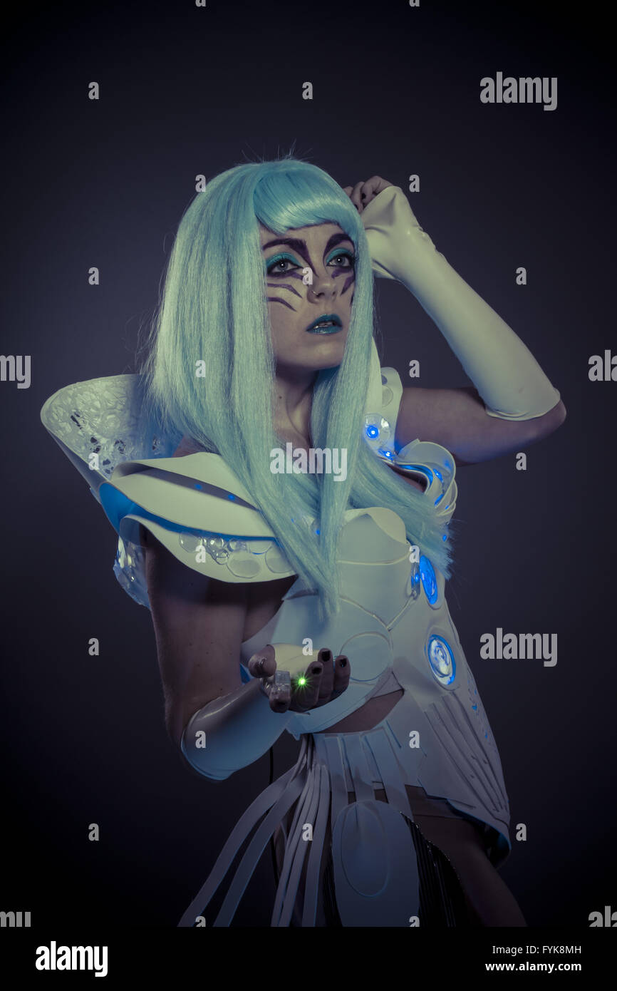 Droid woman, future robot with white armor dress Stock Photo - Alamy