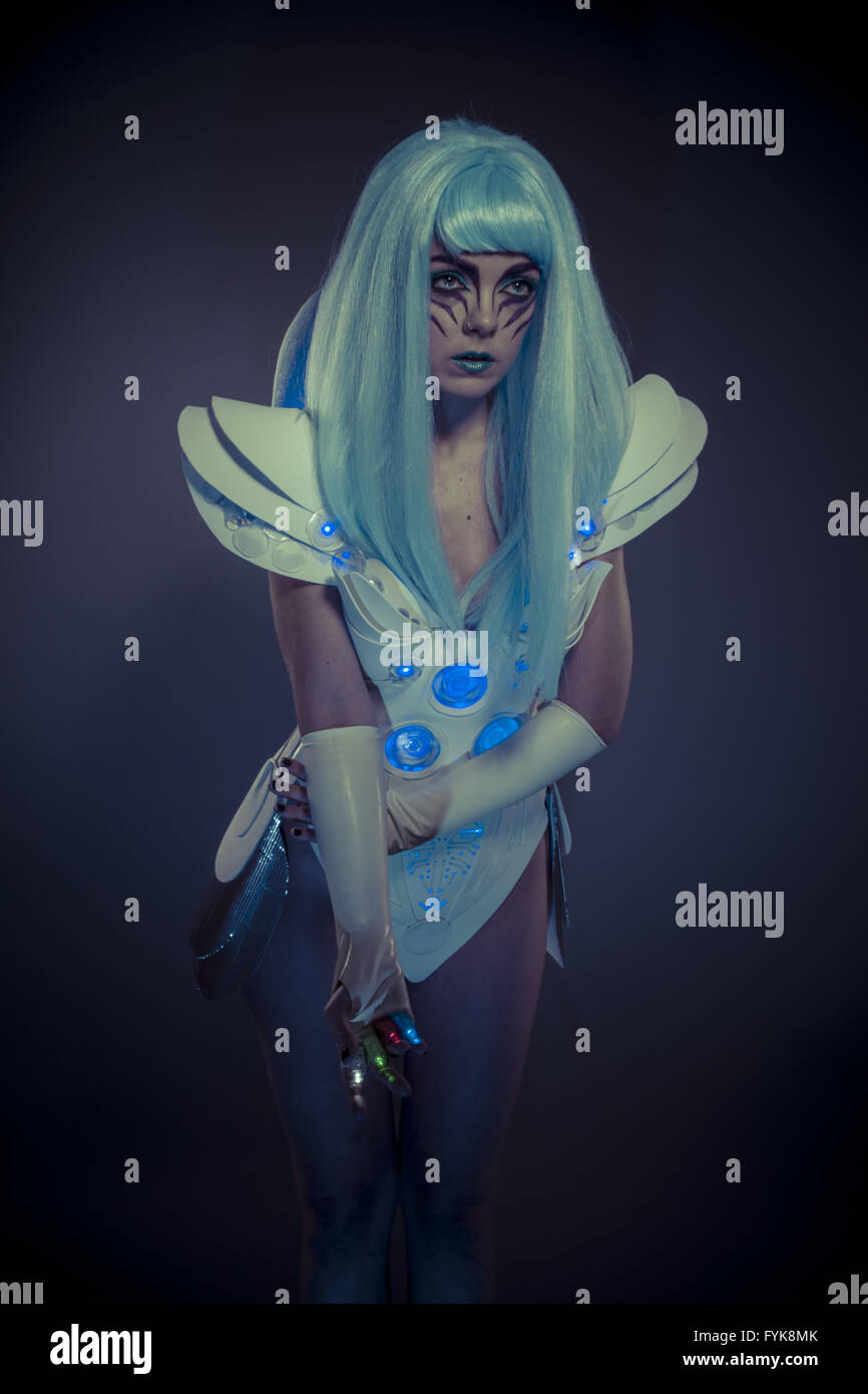Droid woman, future robot with white armor dress Stock Photo - Alamy