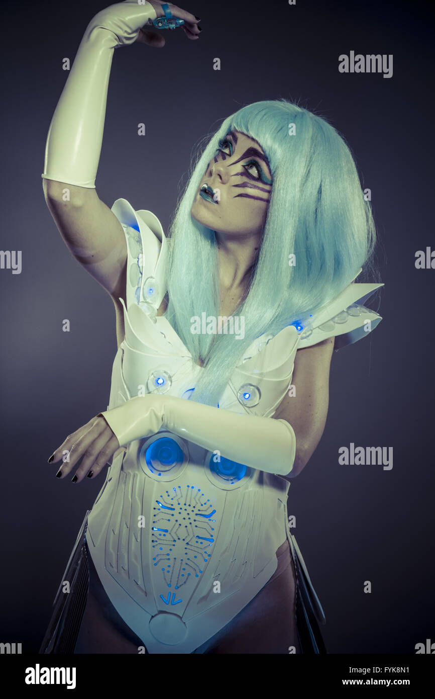 Droid woman, future robot with white armor dress Stock Photo - Alamy