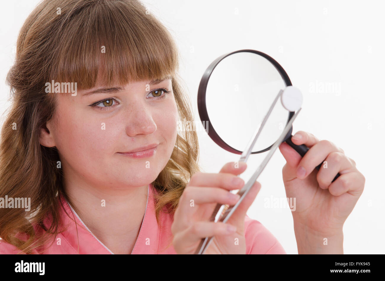 Student book magnifying glass hi-res stock photography and images - Alamy
