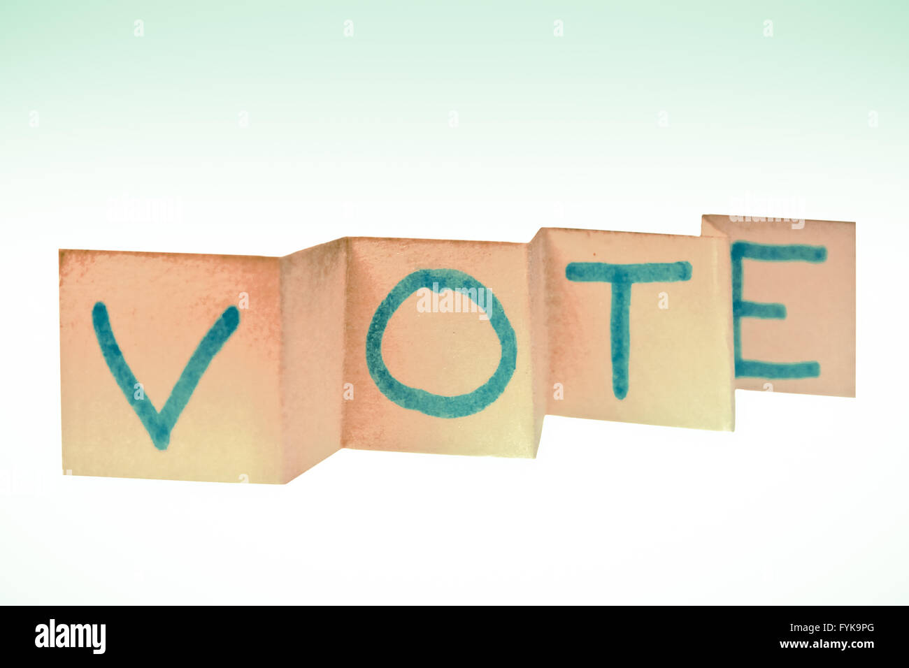 VOTE word written on paper Stock Photo - Alamy