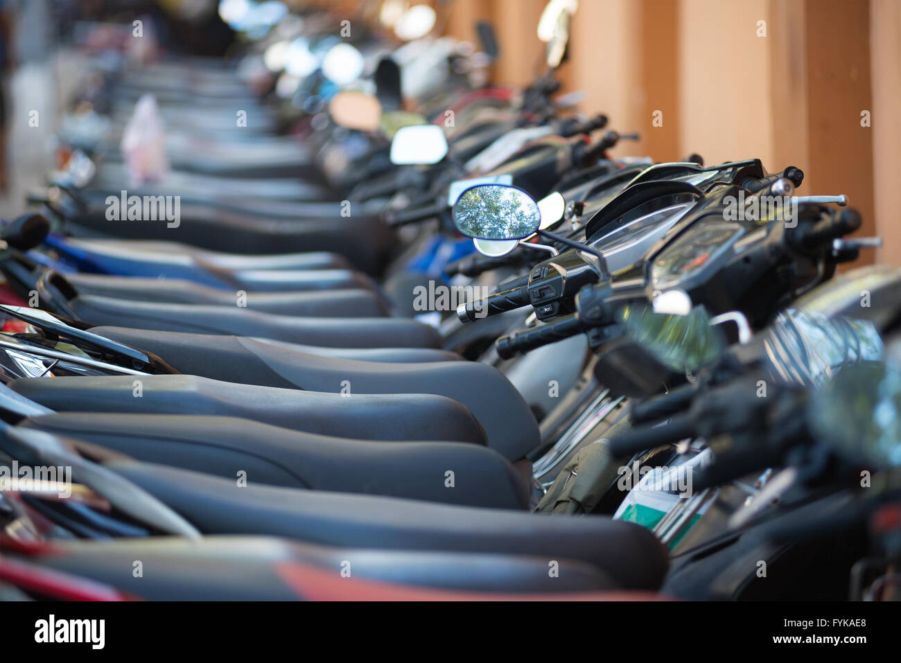 many motorcycles at parking lot Stock Photo - Alamy