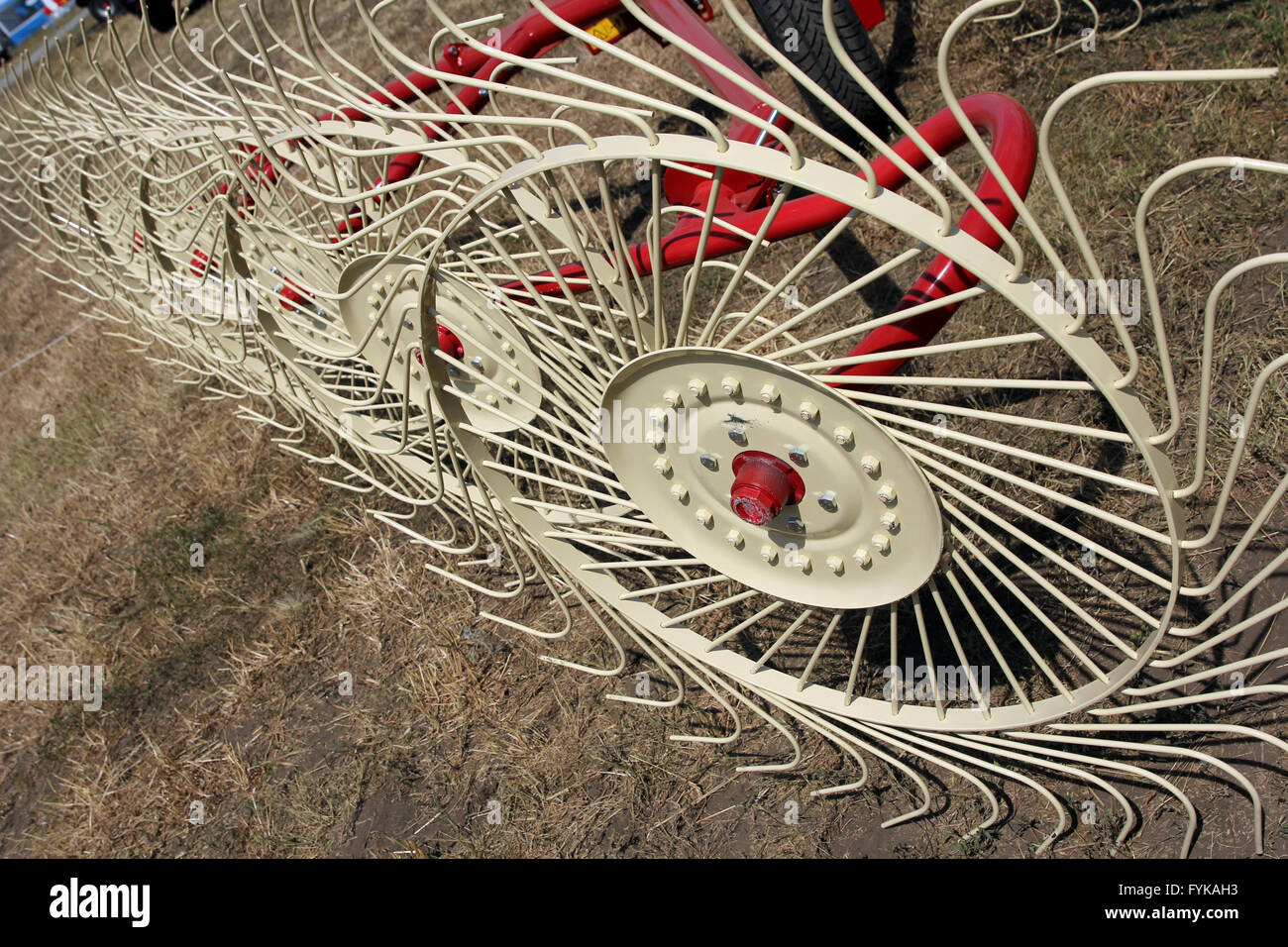 New hay raker farm equipment. Agricultural machinery Stock Photo - Alamy