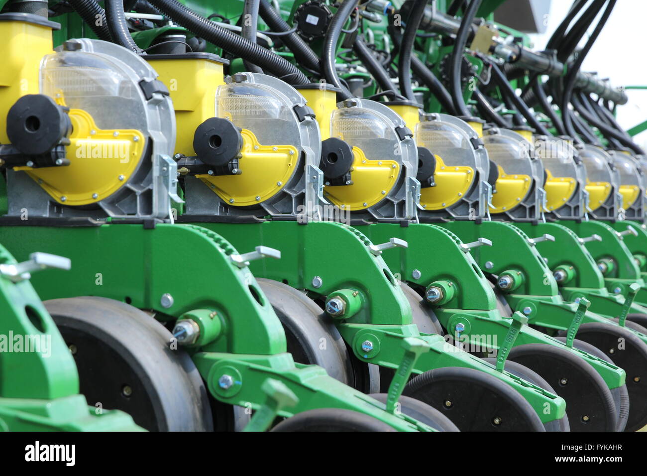 tractor and seeder planting crops on a field Stock Photo - Alamy