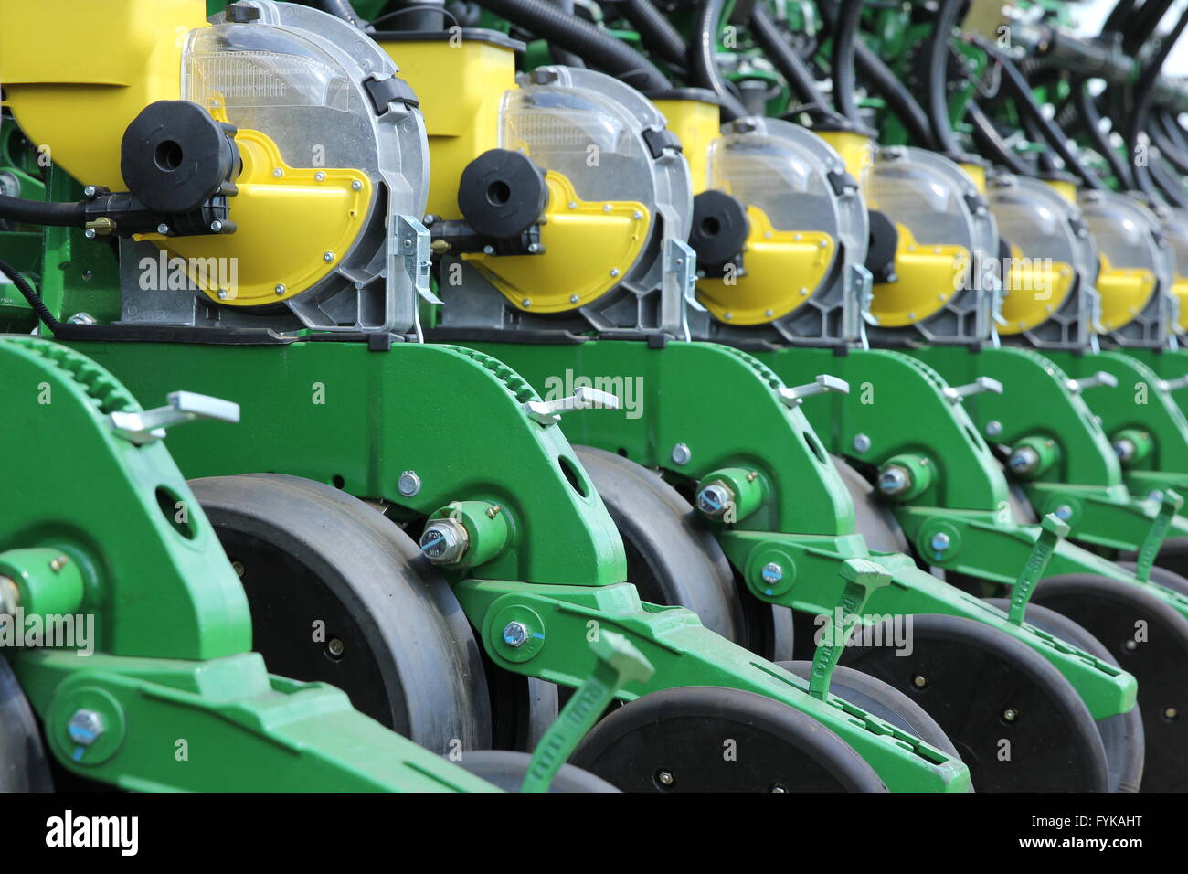 tractor and seeder planting crops on a field Stock Photo - Alamy