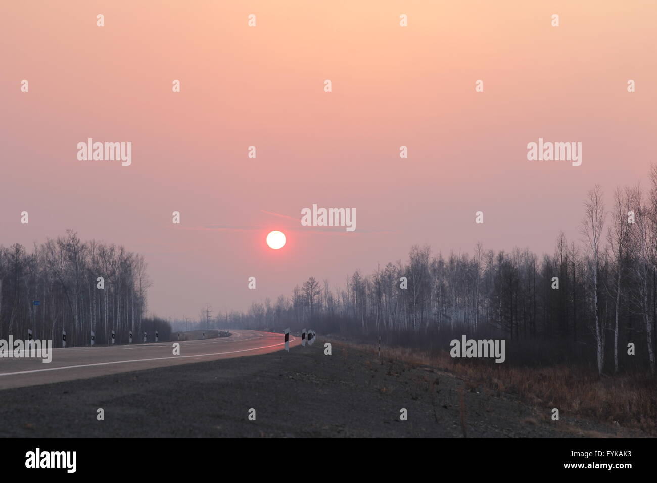 Road to Siberia in winter sunset Stock Photo - Alamy