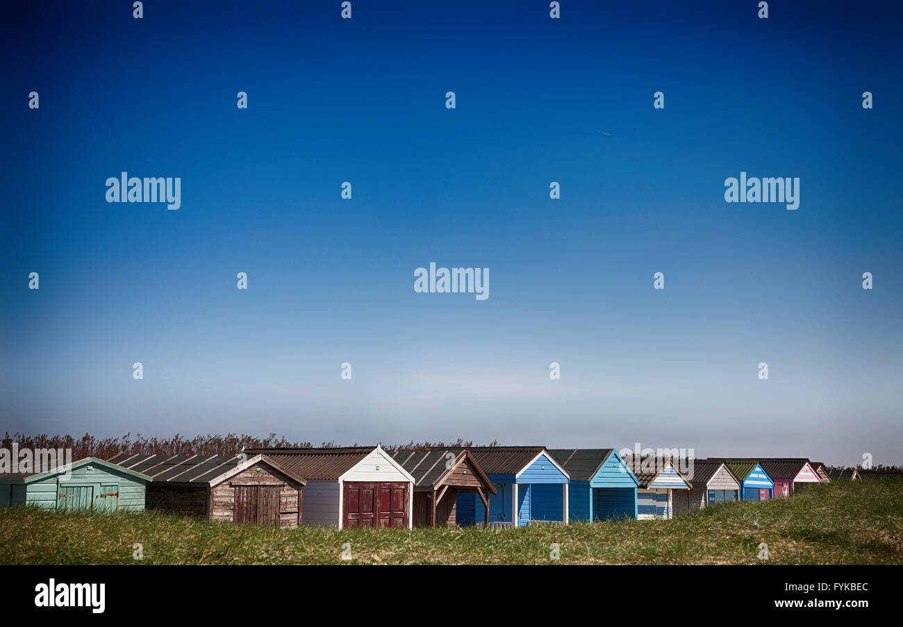 Beach huts on the sea front Stock Photo - Alamy