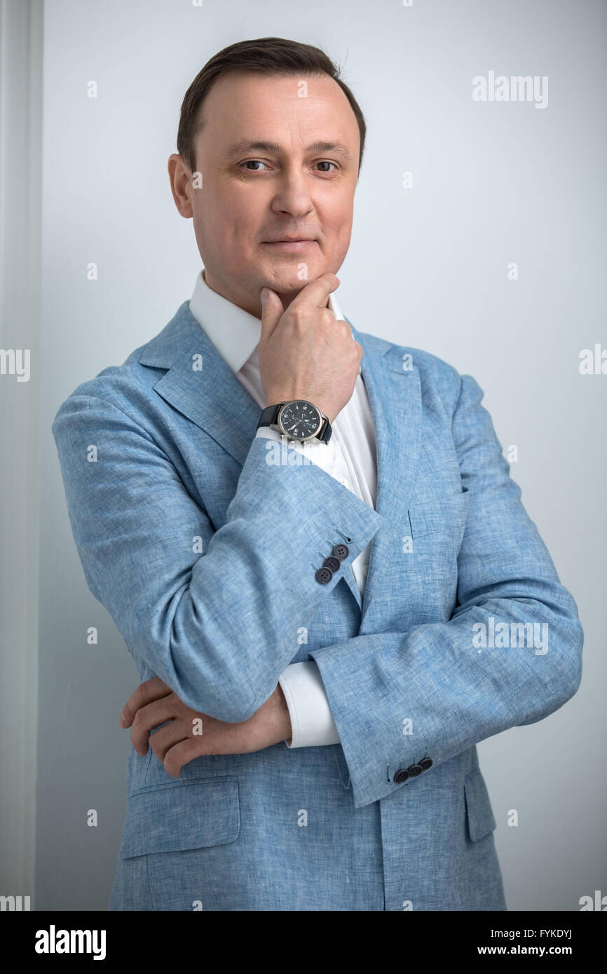 Handsome man in a blue jacket Stock Photo - Alamy