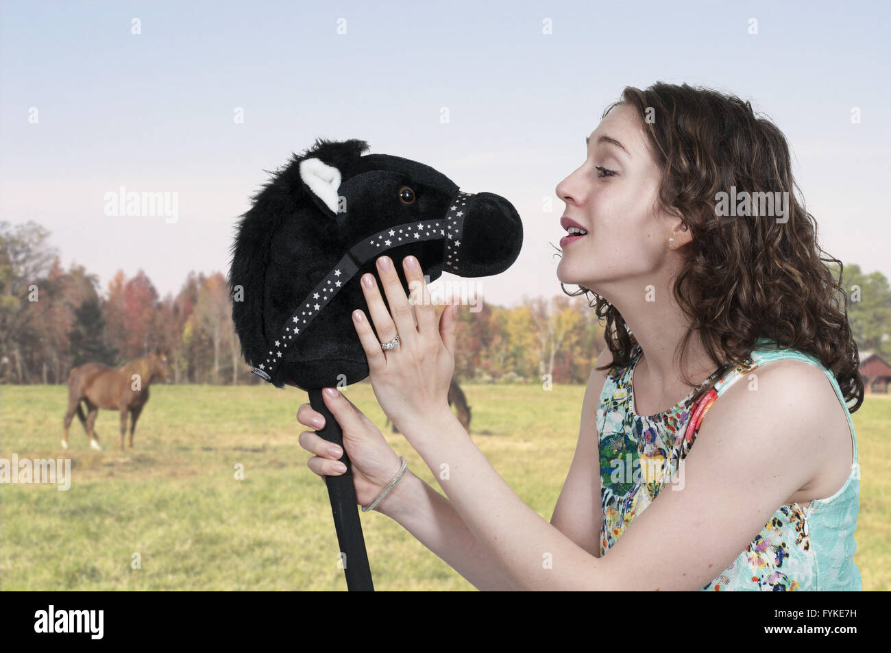 Woman Stick Horse Stock Photo - Alamy
