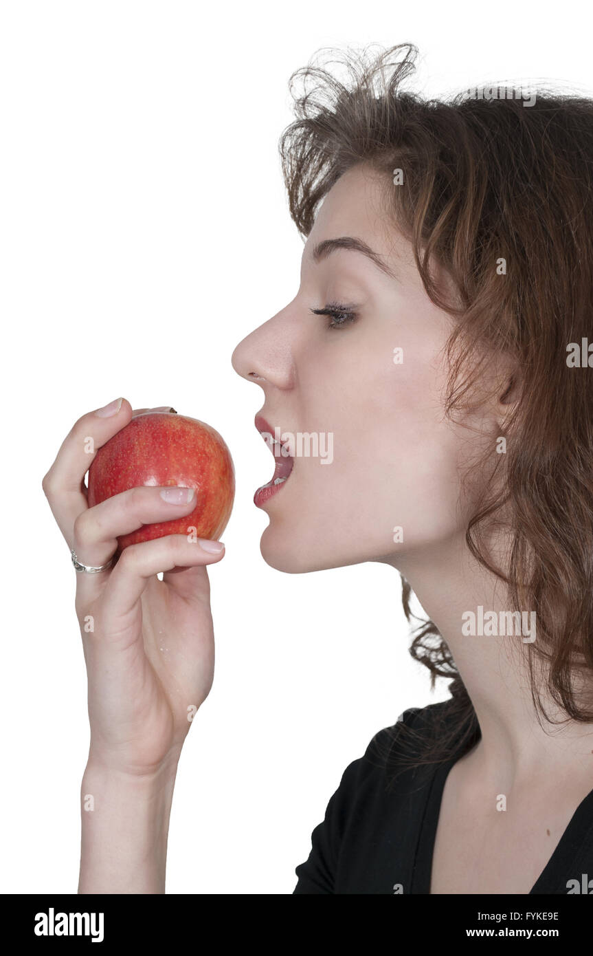 Woman Eating an Apple Stock Photo - Alamy