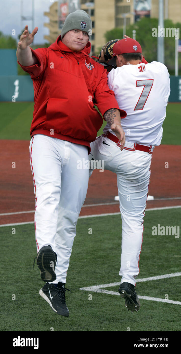 Usa. 26th Apr, 2016. SPORTS -- The Lobo's Chris DeVito, left, bumps ...