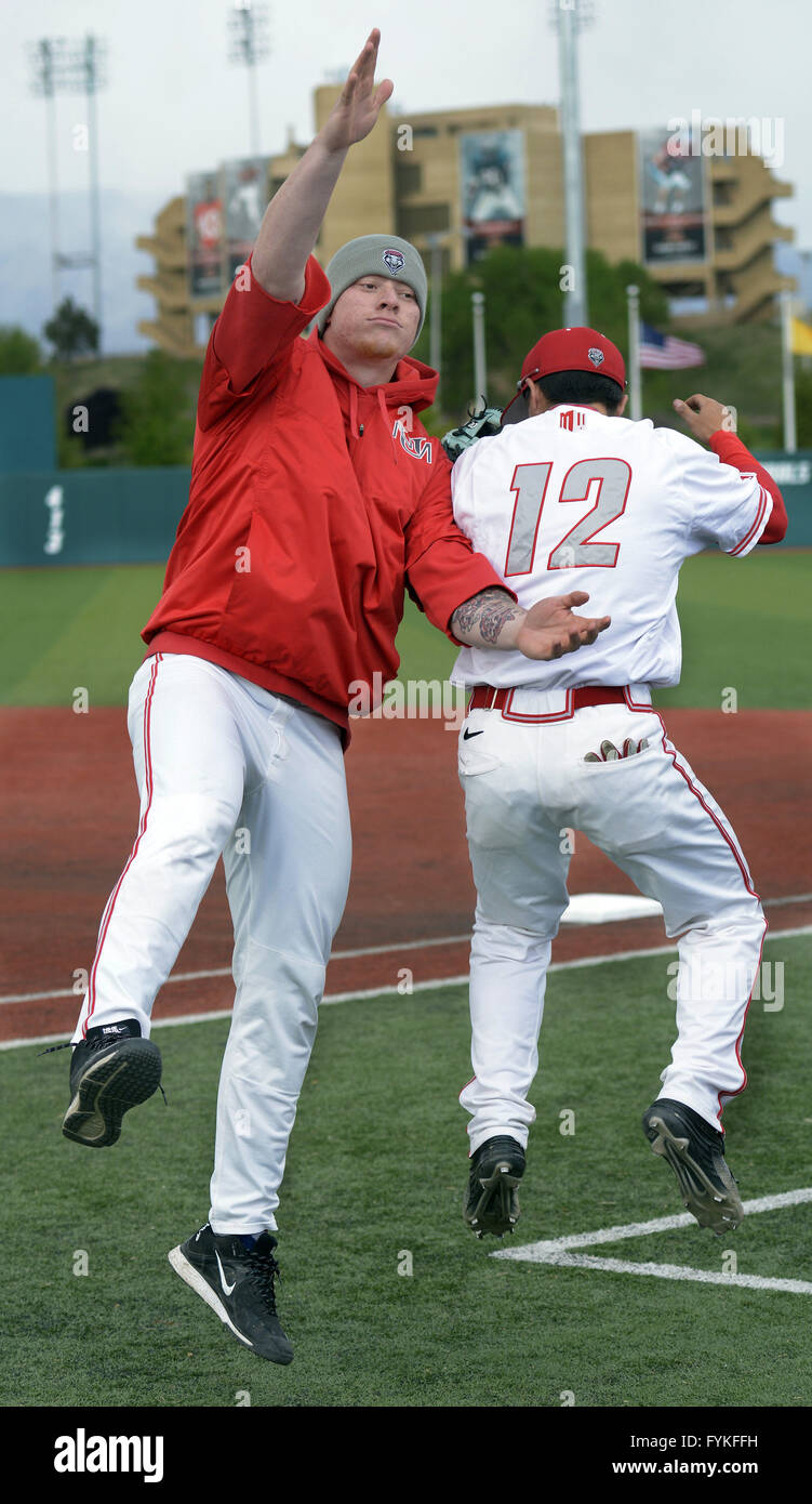 Usa. 26th Apr, 2016. SPORTS -- The Lobo's Chris DeVito, left, bumps ...