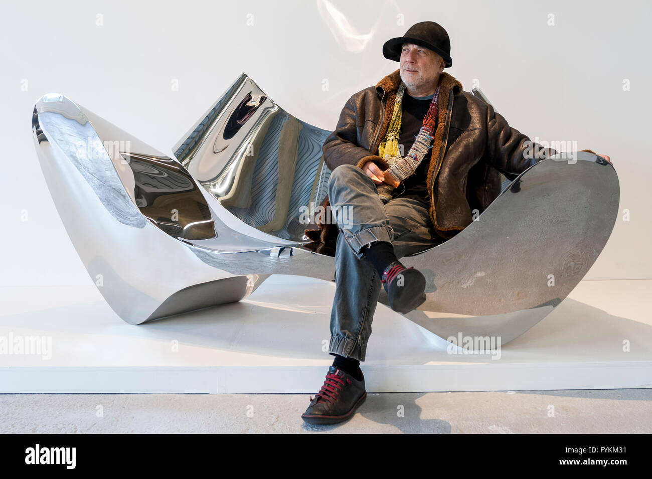 London, UK. 27 April 2016. Acclaimed designer, Ron Arad, sits on one of ...