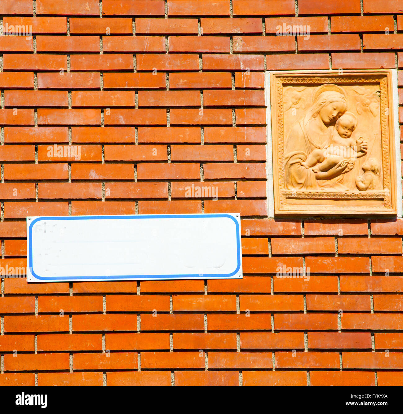 milan italy old church concrete wall brick madonna Stock Photo - Alamy