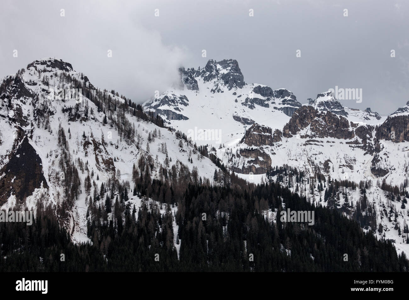 Cloudy spring weather in Dolomites mountains Stock Photo - Alamy