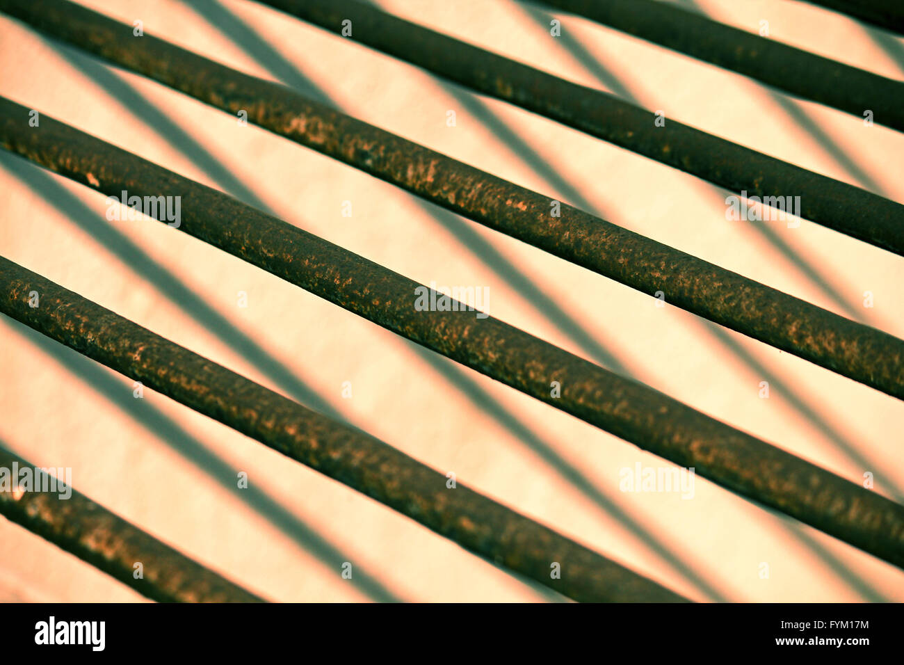 Safety Grill with shadow creating a pattern Stock Photo - Alamy