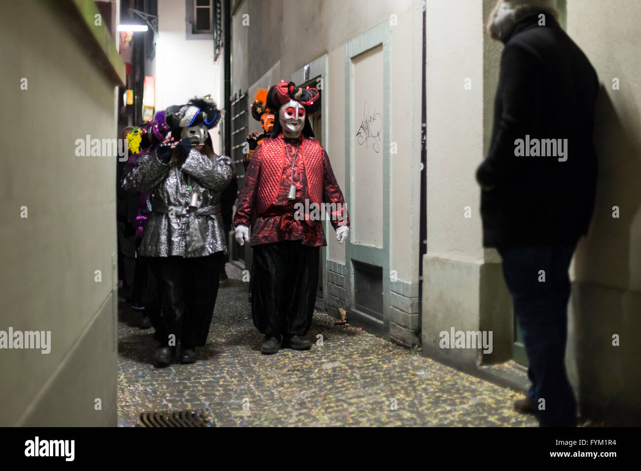 View on a small group of Basel carnival participants in their costumes ...