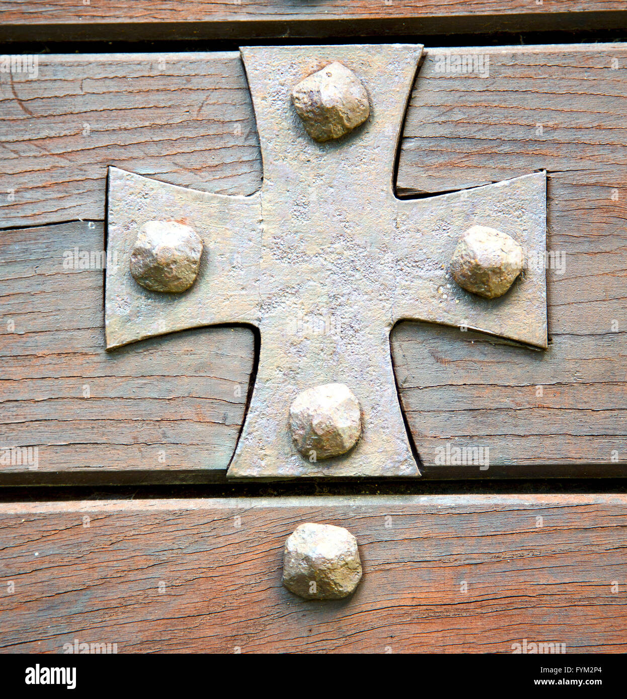 cross lombardy arsago a door curch closed Stock Photo - Alamy