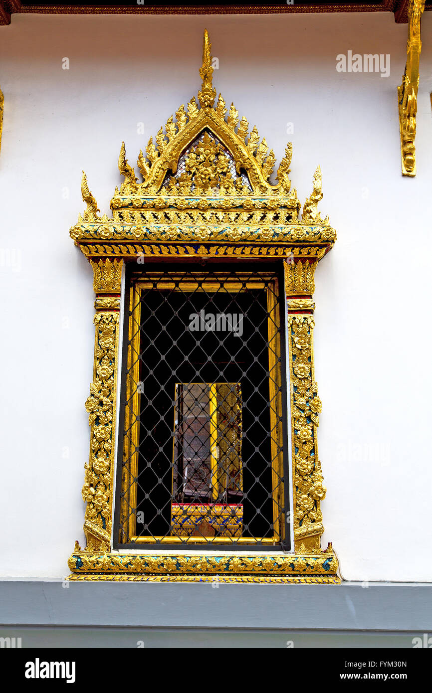 window in gold temple grate Stock Photo - Alamy