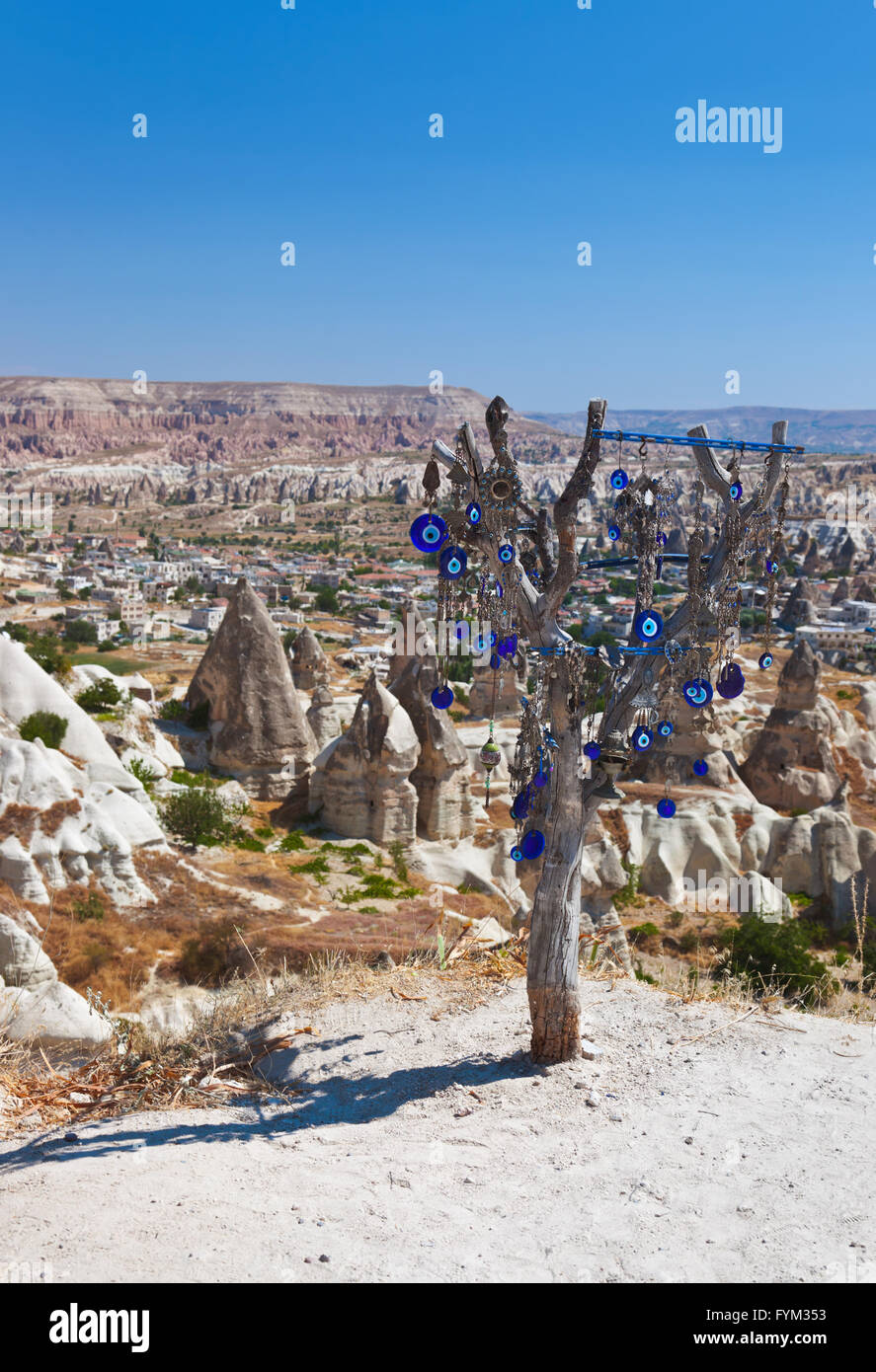 Tree and evil eye amulet in Cappadocia Turkey Stock Photo - Alamy