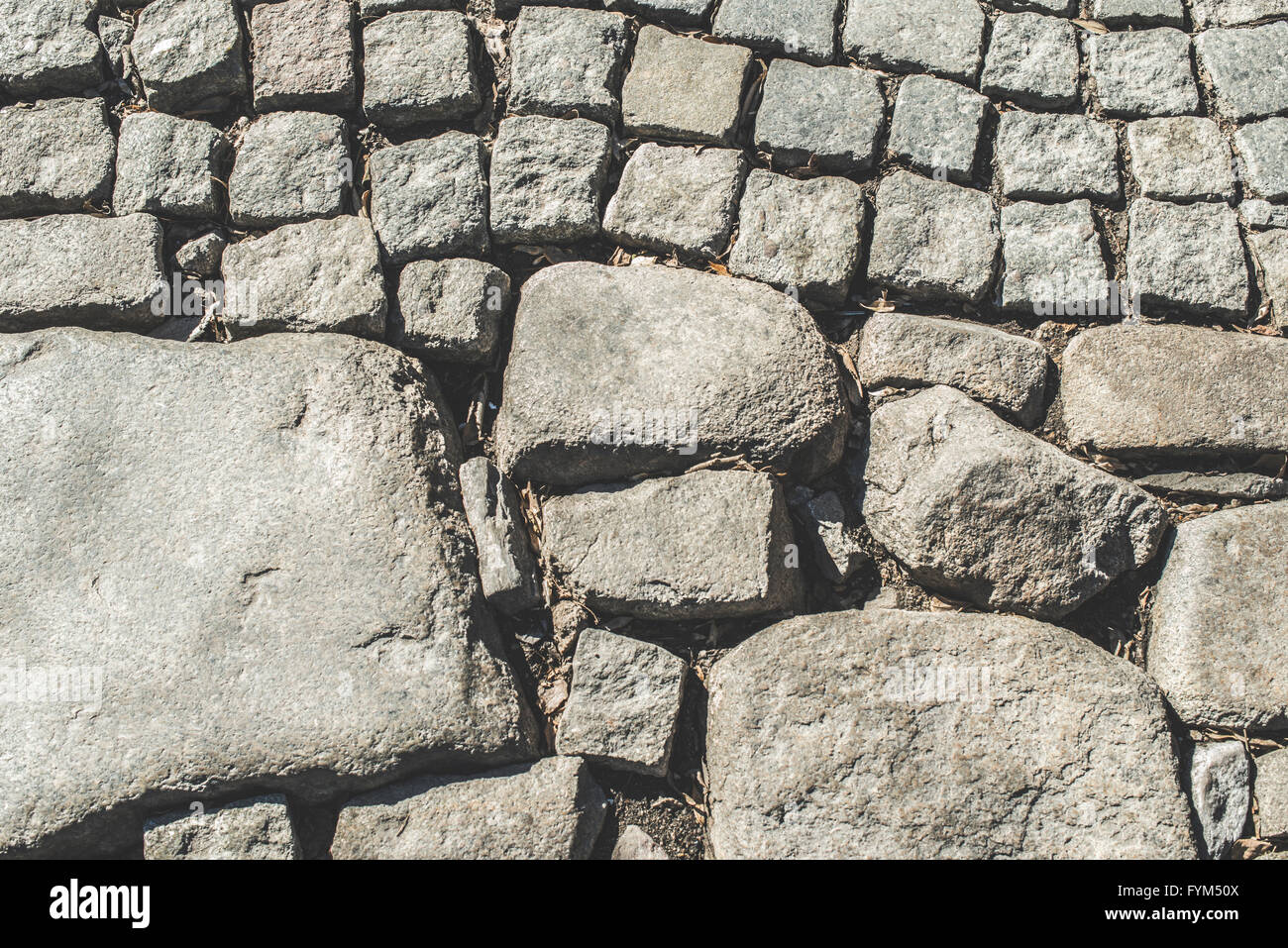 Old paved road and big stones Stock Photo - Alamy