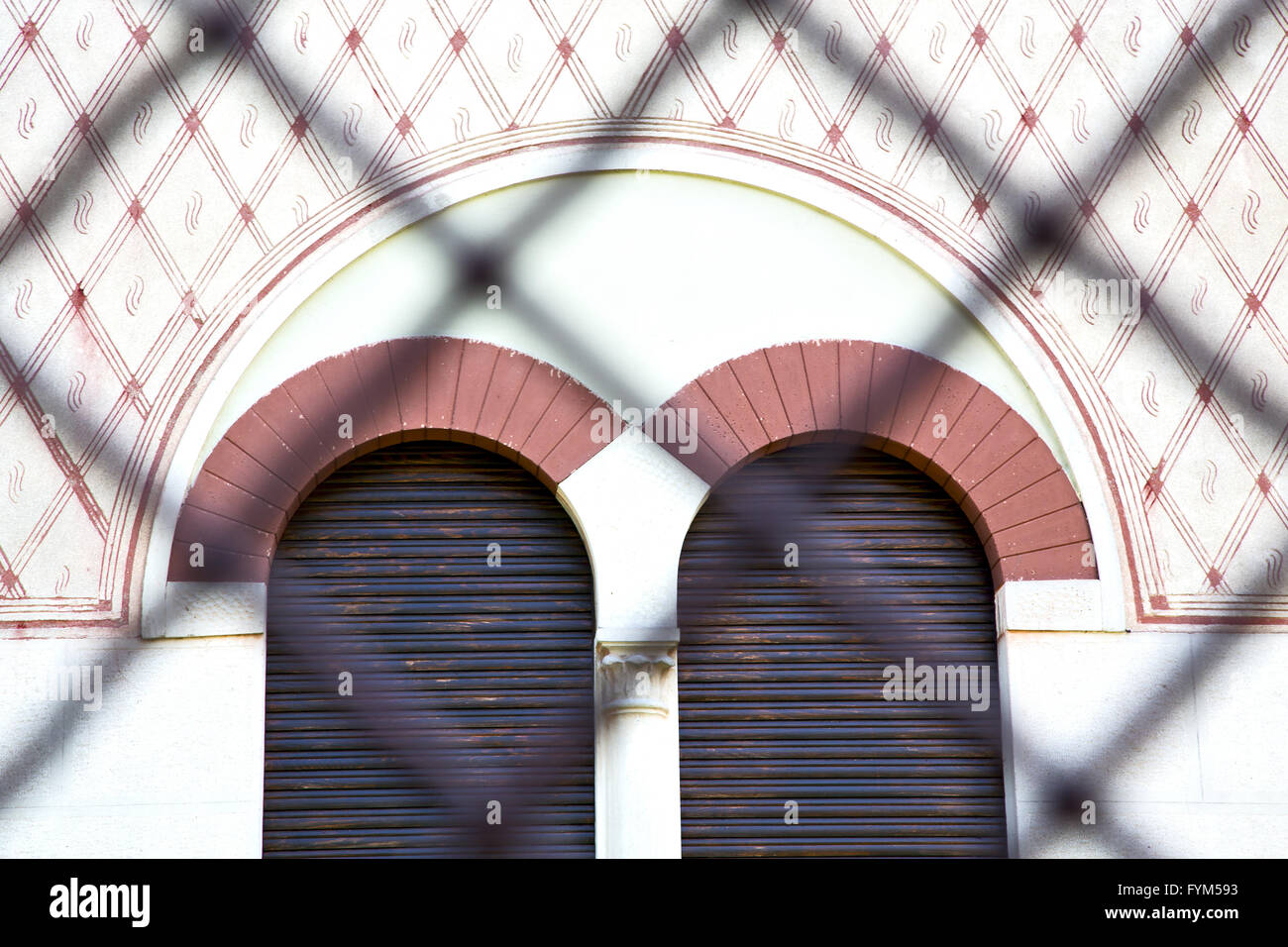 rose window italy lombardy in the abbiate old tile shutter Stock Photo ...