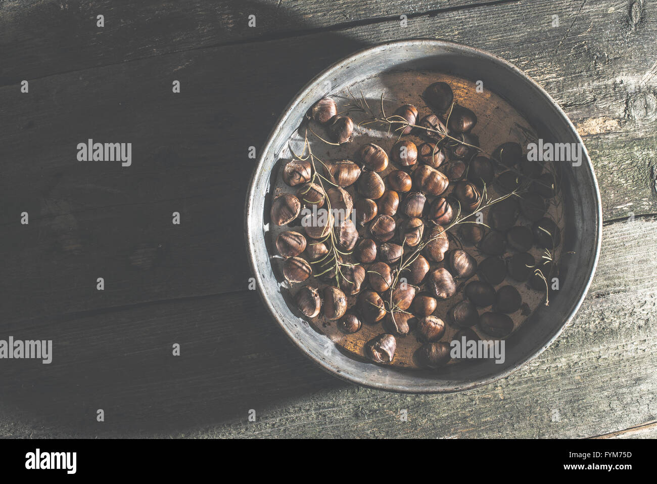 Roasted chestnuts. Vintage style. Autumn leaves Stock Photo - Alamy