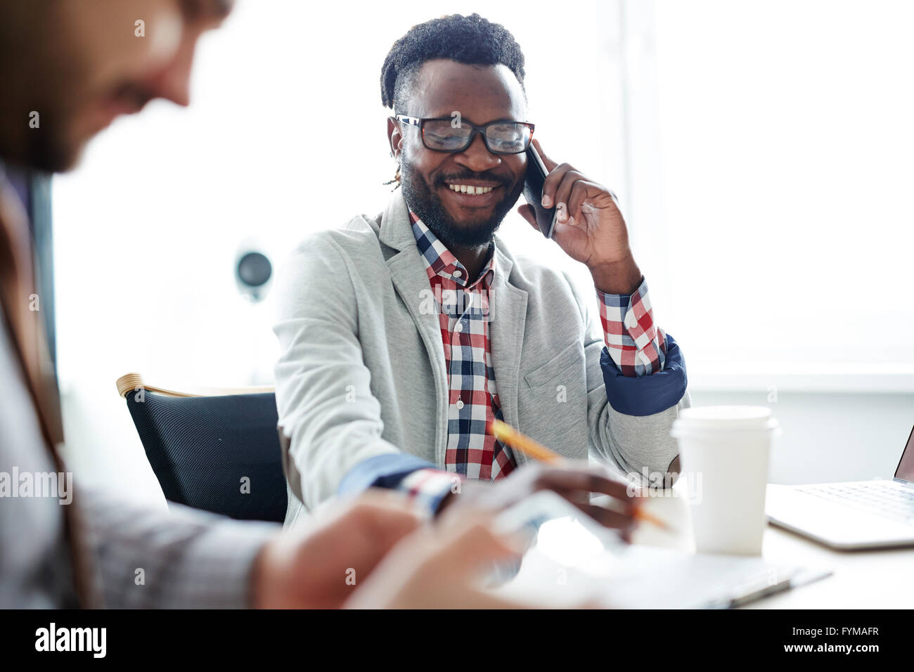 Office worker calling Stock Photo - Alamy