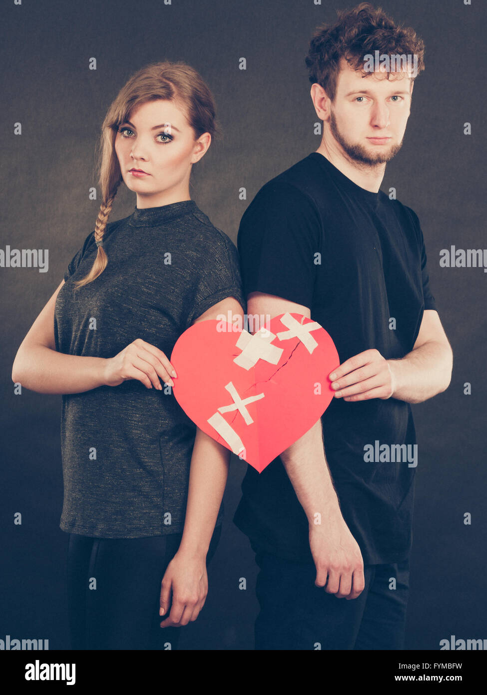 Broken heart difficult love concept. Sad unhappy couple woman and man ...