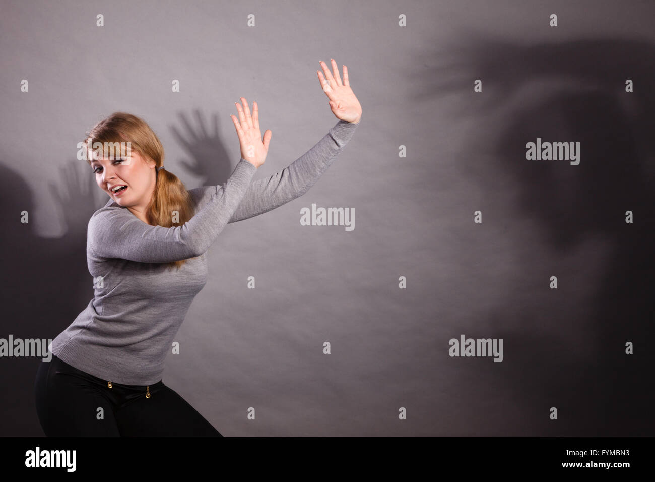 Violence against woman. Scared afraid woman. Negative relations in ...