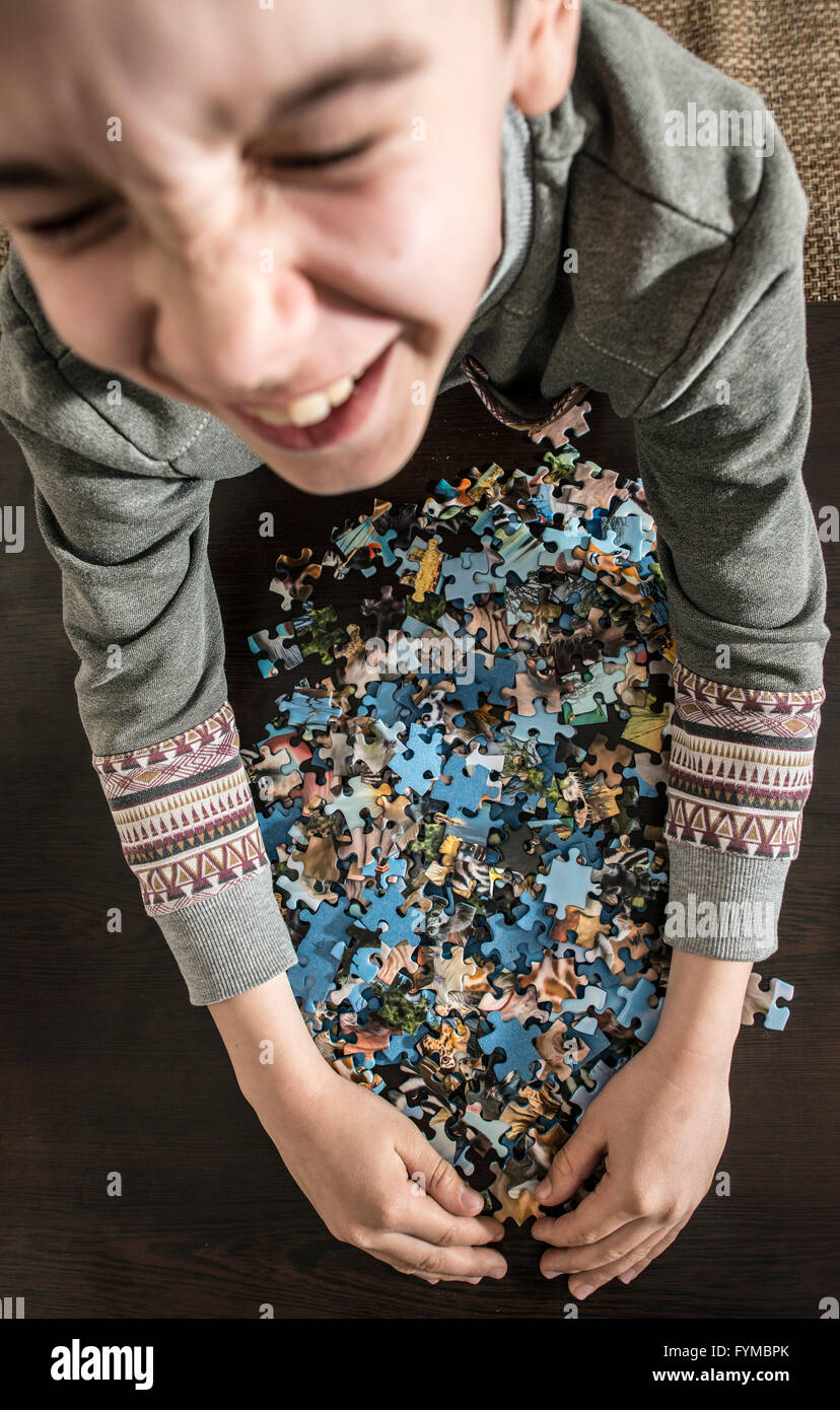 Child and puzzle Stock Photo - Alamy