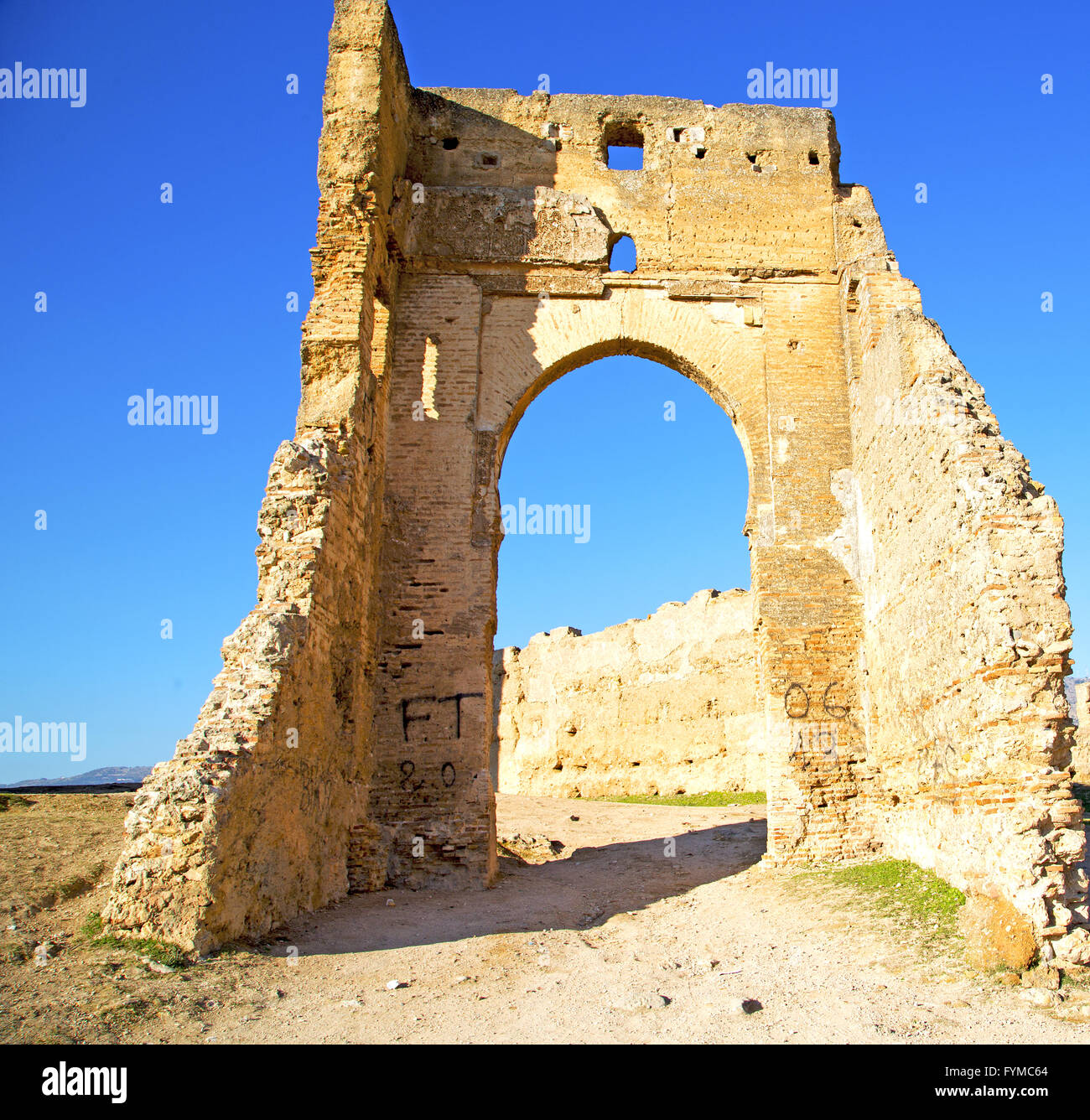 morocco arch in africa old construction street the blue sky Stock Photo ...