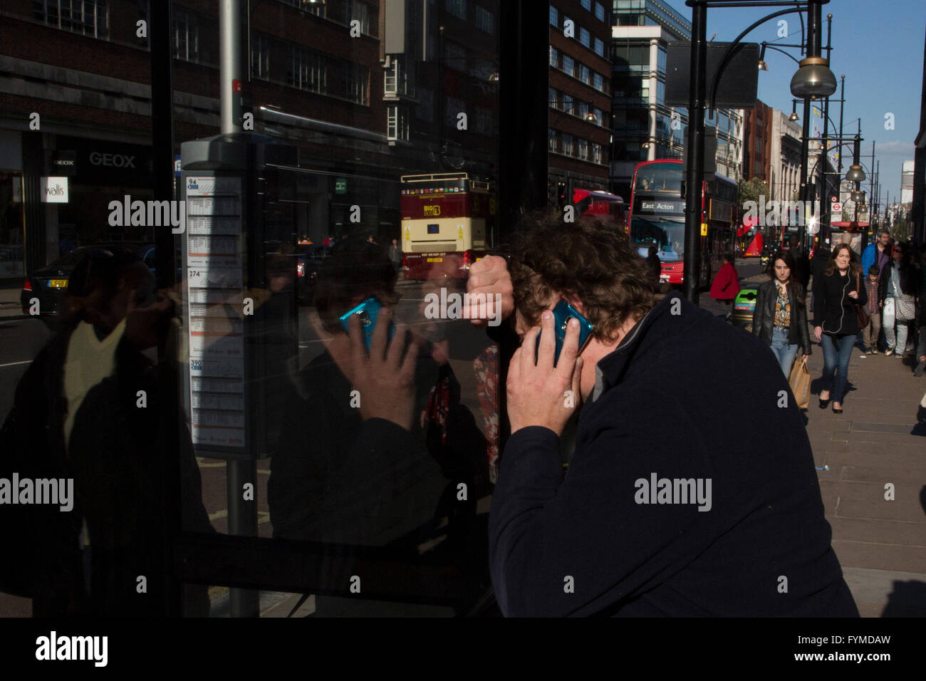 a man on the phone in Oxford Street, London, England, UK Stock Photo ...