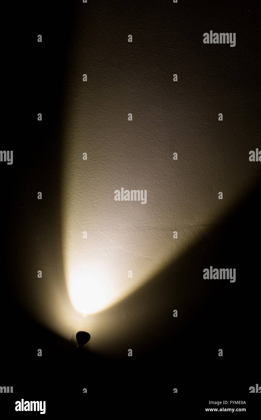 Dark Wall Illuminated from the Left Corner Spotlight Lamp Stock Photo ...