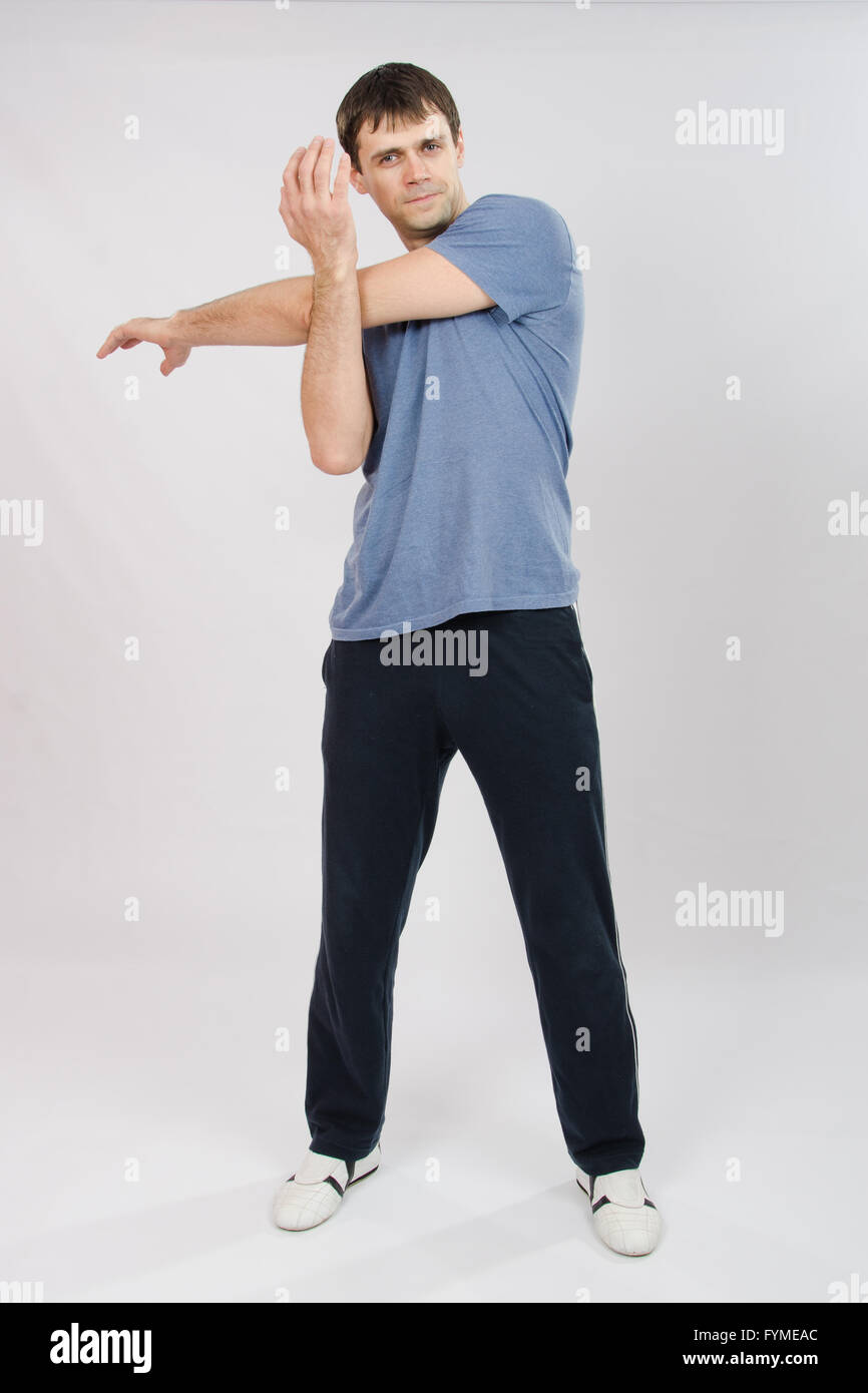 Athlete flexing arm muscles Stock Photo - Alamy