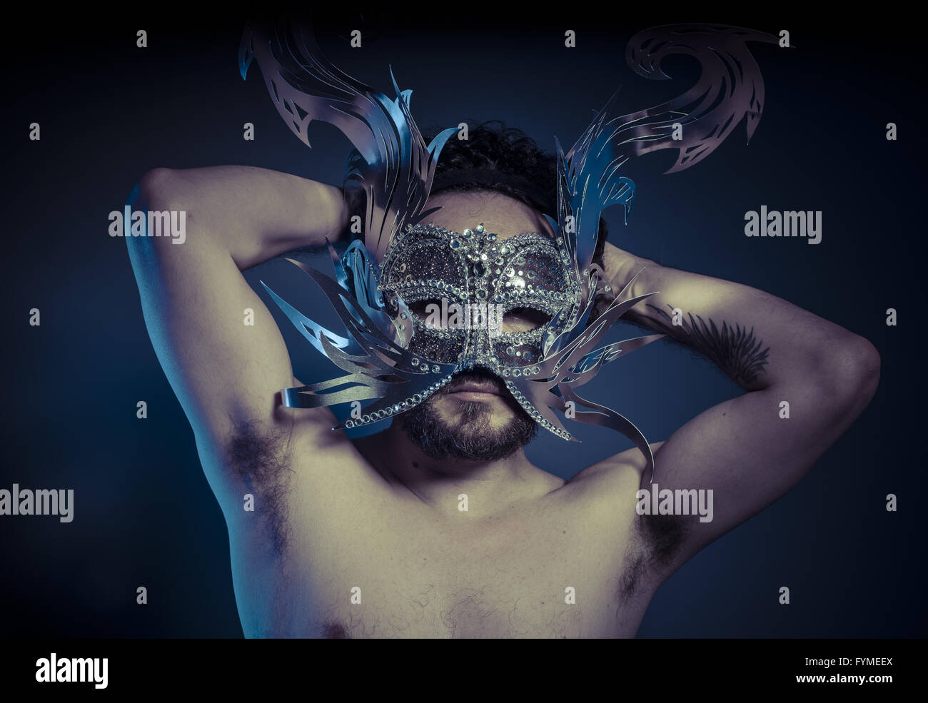 Treasure, jewels and silver. Man with mask of precious metals Stock ...