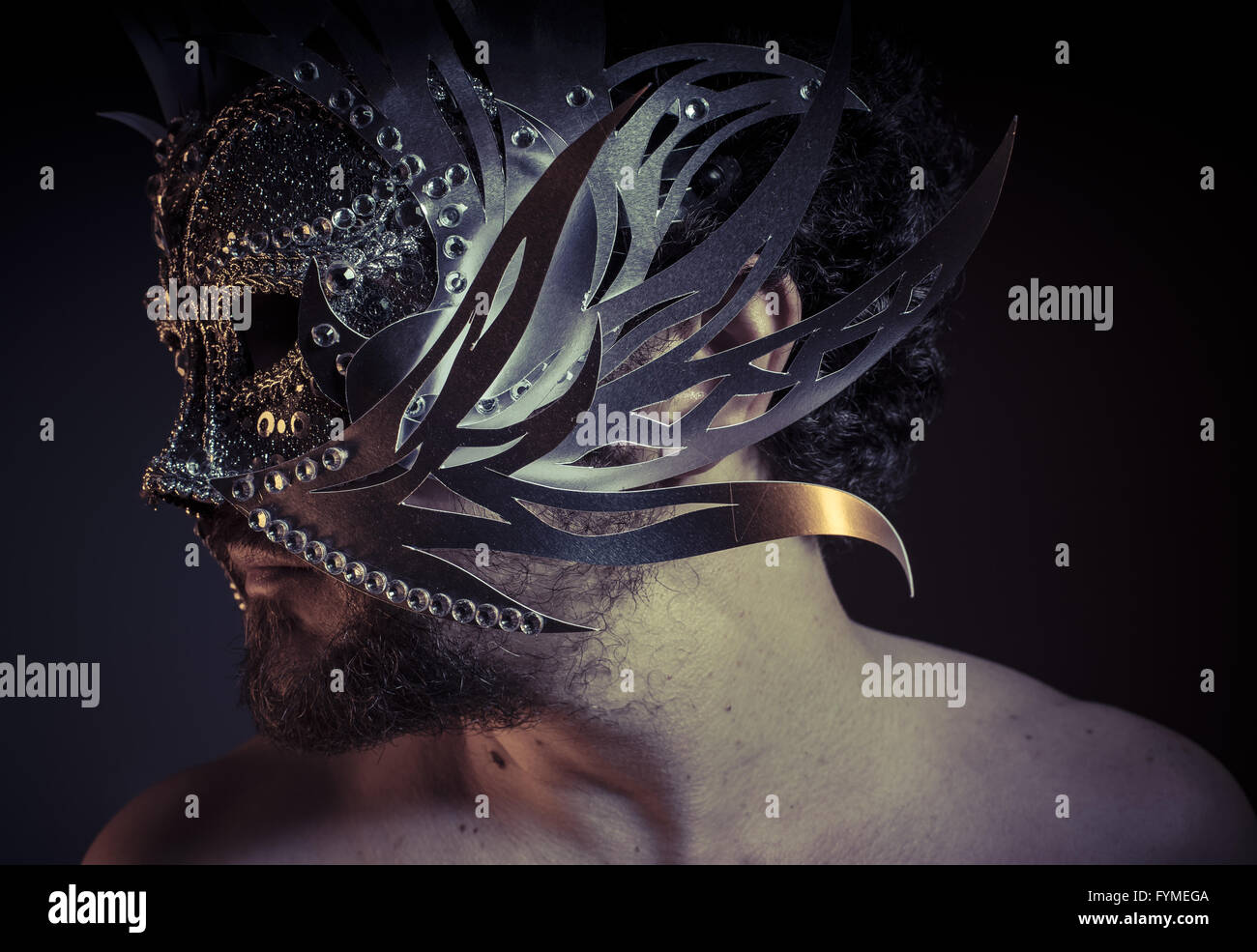 Gold, Treasure, jewels and silver. Man with mask of precious metals ...