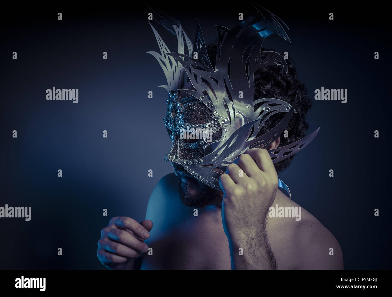 Woman With Silver Mask And Blue Costume High Resolution Stock ...