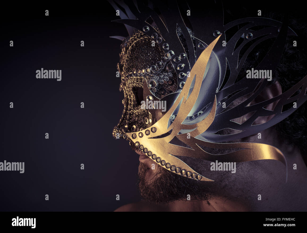 Gold, Treasure, jewels and silver. Man with mask of precious metals ...