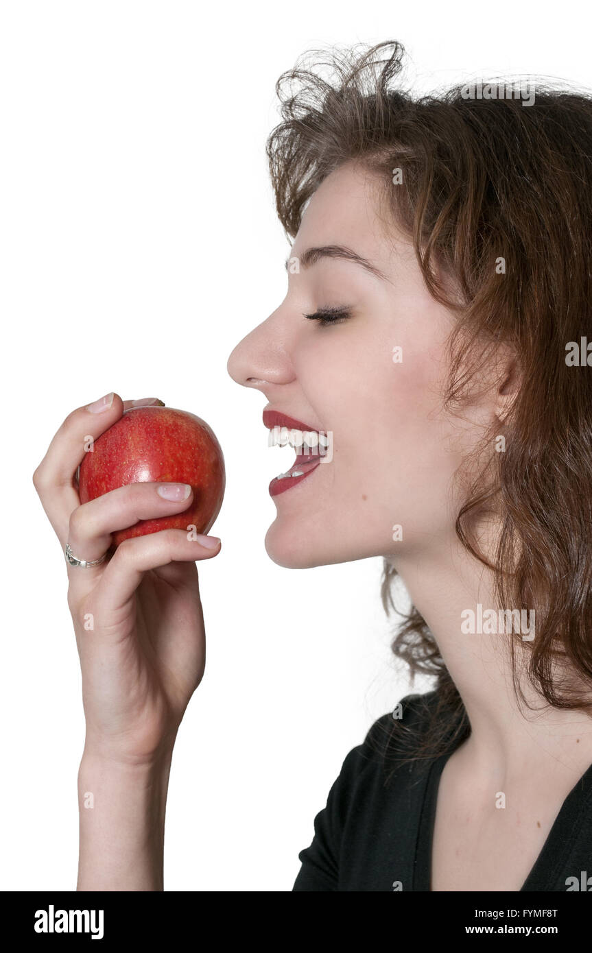 Woman Eating an Apple Stock Photo - Alamy