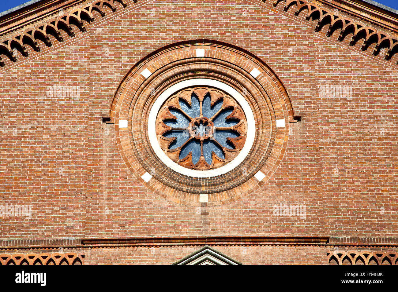 rose window italy lombardy in the castellanza old brick tower tile ...