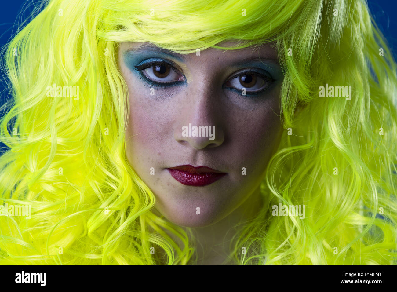 Sad, young girl with yellow hair Stock Photo - Alamy
