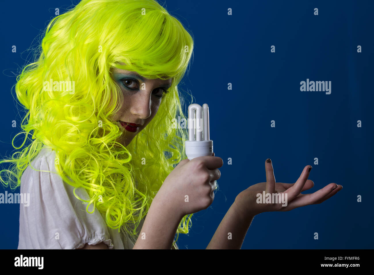 Light bulb symbol woman hi-res stock photography and images - Alamy